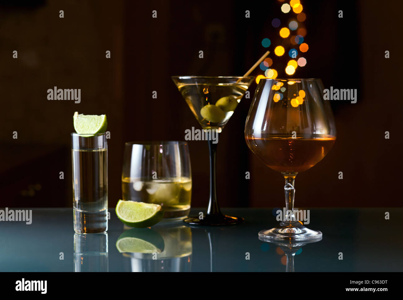 Alcoholic drinks in a bar on a glass table Stock Photo - Alamy