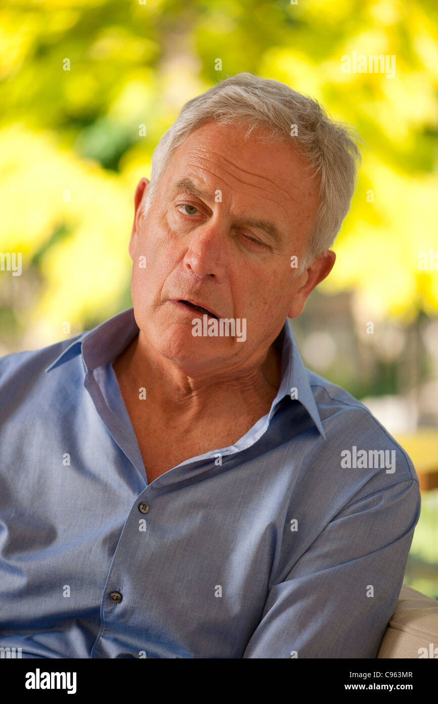 Senior man having a stroke. He is experiencing facial weakness Stock ...