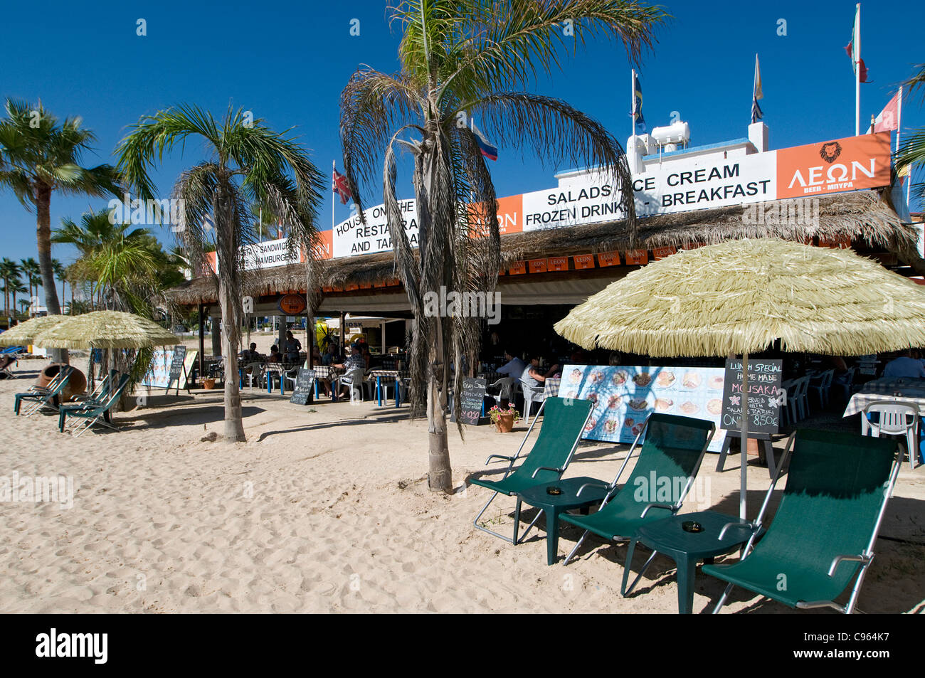 Taverna on Sandy Bay Beach, Ayia Napa, Cyprus Stock Photo - Alamy