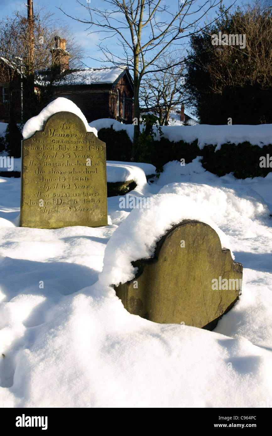 Gravestones in the snow in an abandoned graveyard, Chapel Allerton ...