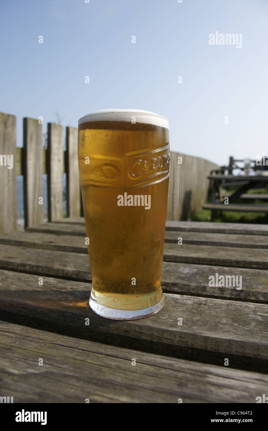 Man drinking beer outside bar hi-res stock photography and images - Alamy