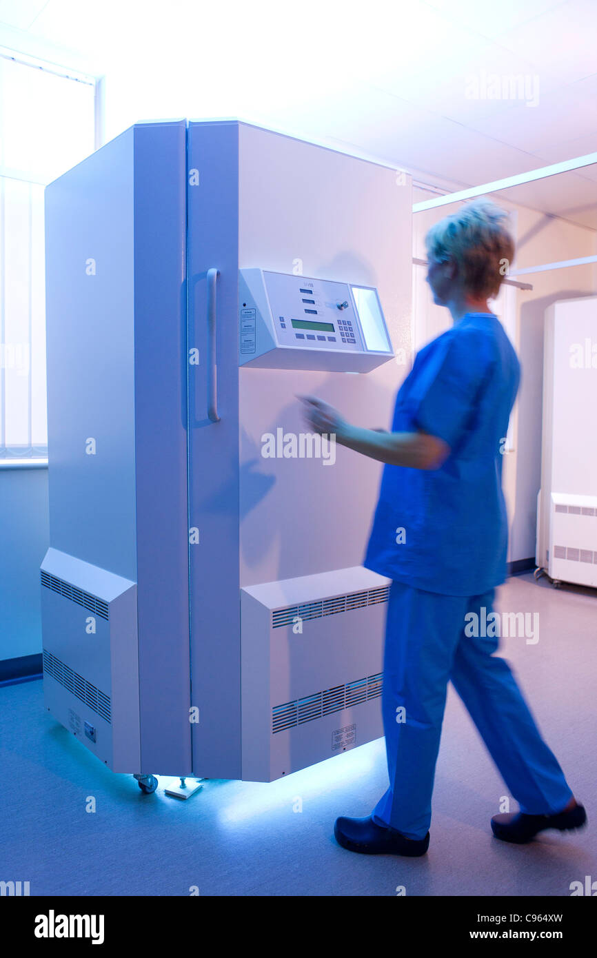 Phototherapy booth. Dermatologist setting up an ultraviolet B ...