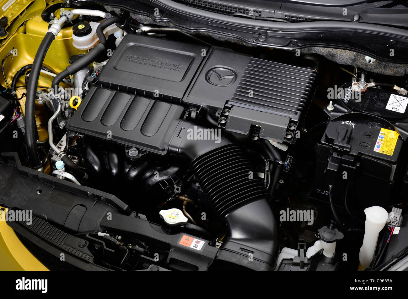 Mazda yellow hi-res stock photography and images - Alamy