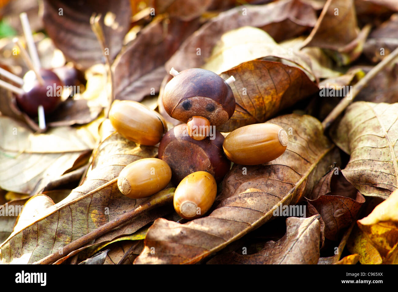Figurine made of chestnuts Stock Photo - Alamy