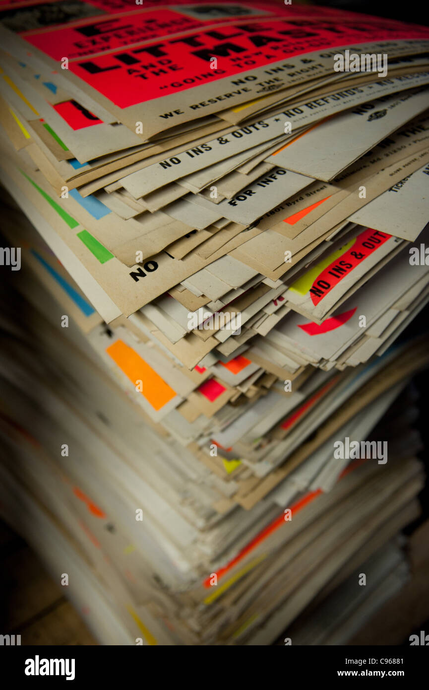 Stack of posters from printing press Stock Photo - Alamy