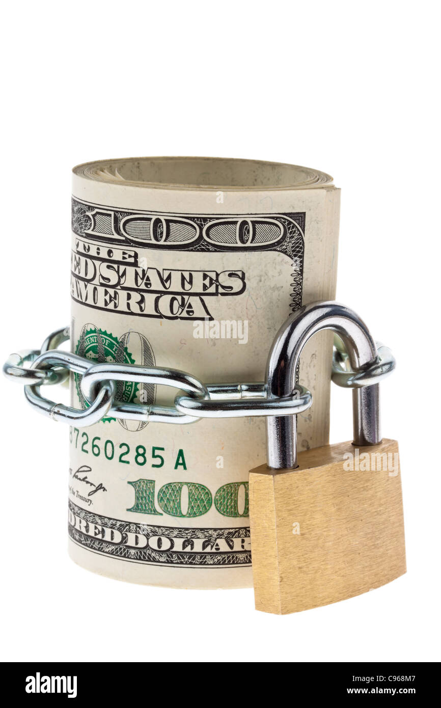 Many dollar bills are locked with a lock Stock Photo - Alamy