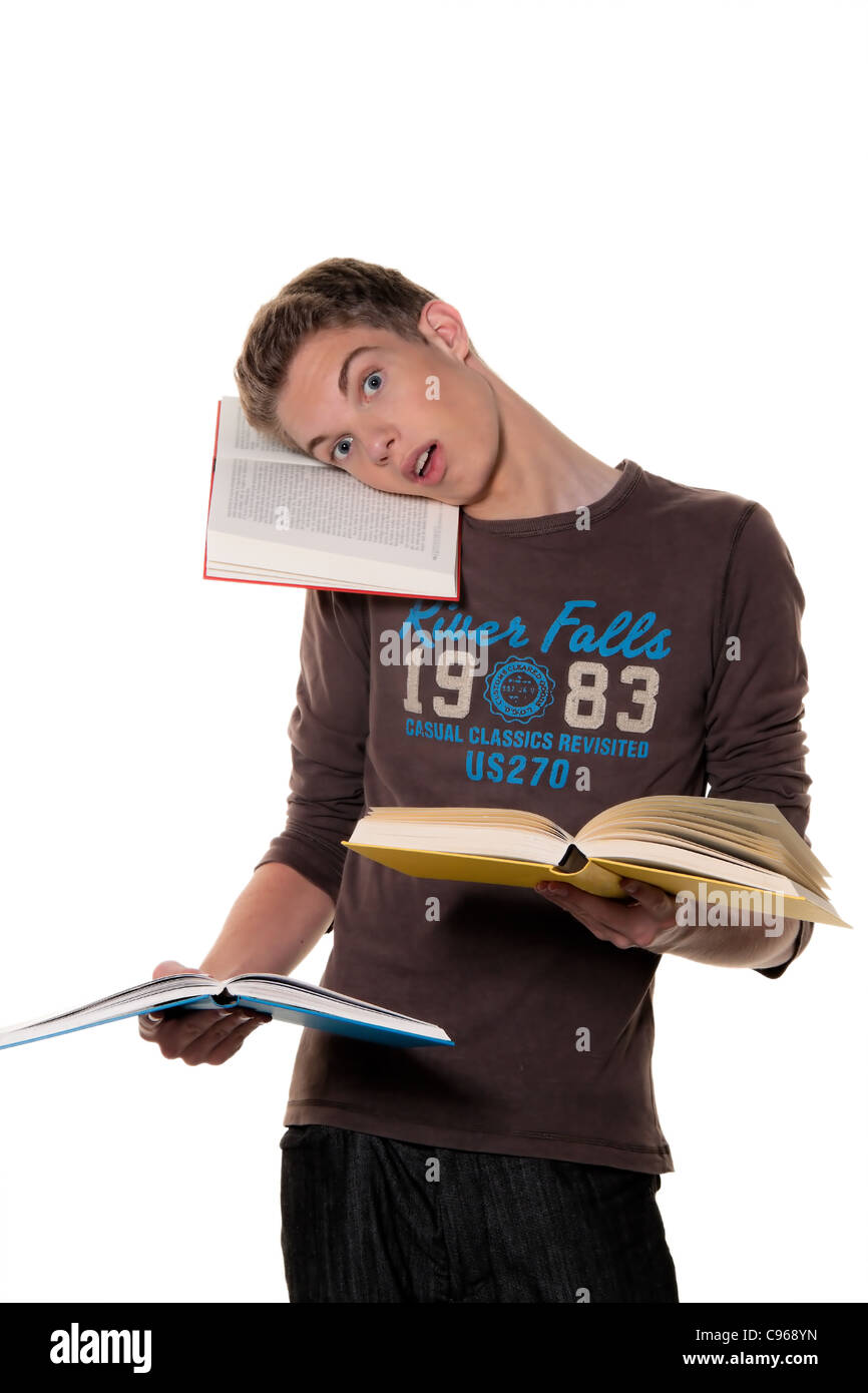 A young student learning with books Stock Photo - Alamy