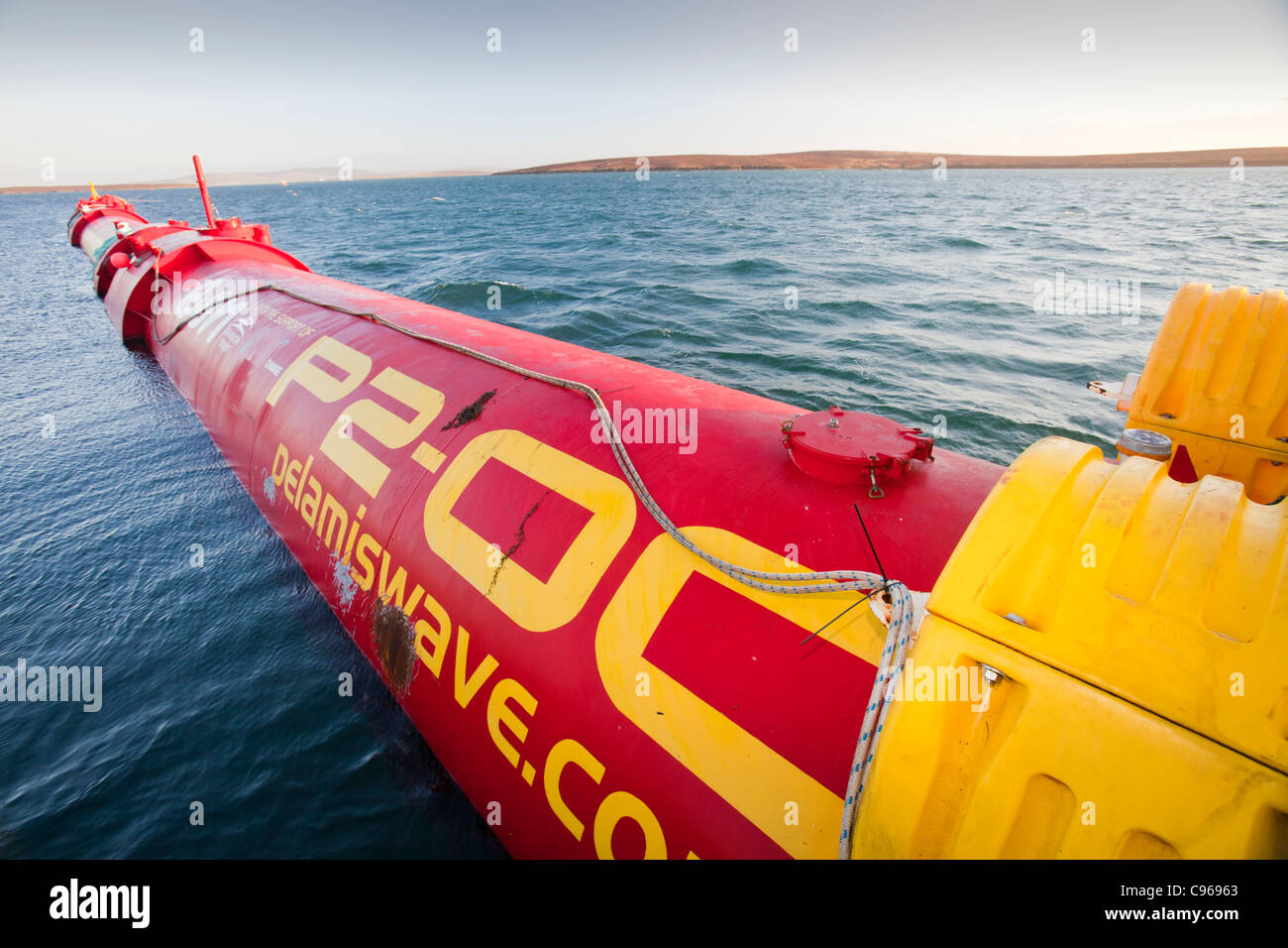 A Pelamis P2 wave energy generator on the dockside at Lyness on Hoy ...