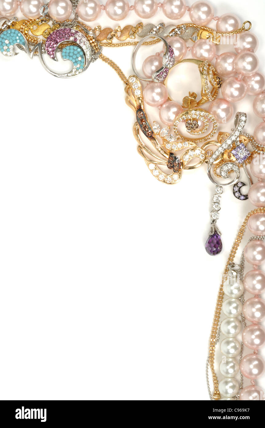 Border from gold jewelry, isolated on white Stock Photo - Alamy