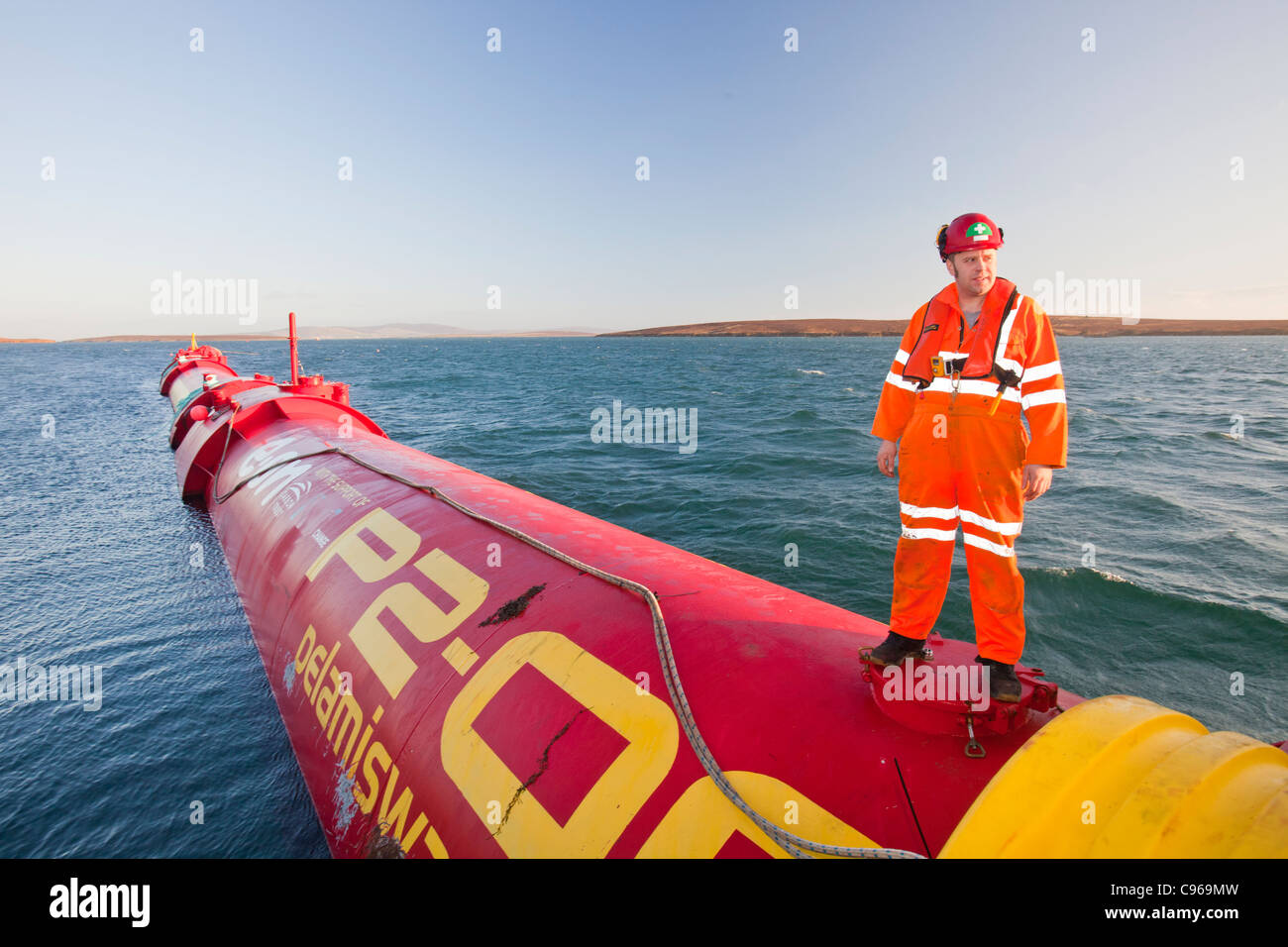A Pelamis P2 wave energy generator on the dockside at Lyness on Hoy ...