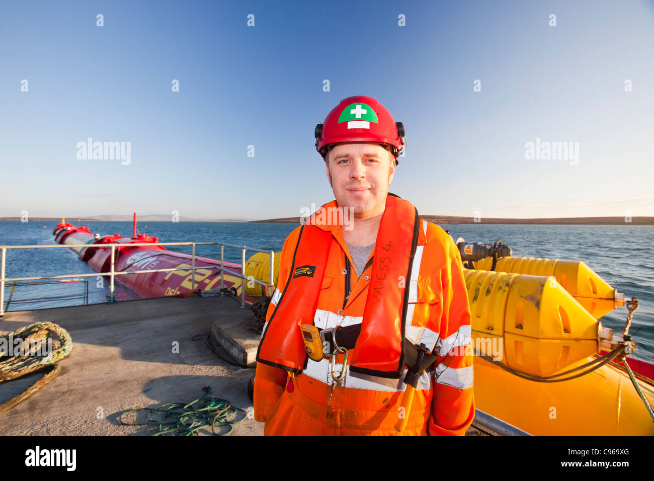 A Pelamis P2 wave energy generator on the dockside at Lyness on Hoy ...