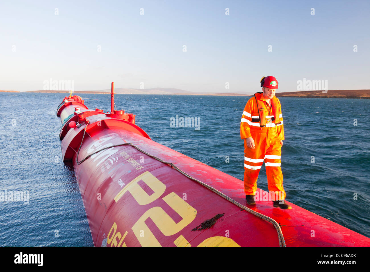 A Pelamis P2 wave energy generator on the dockside at Lyness on Hoy ...