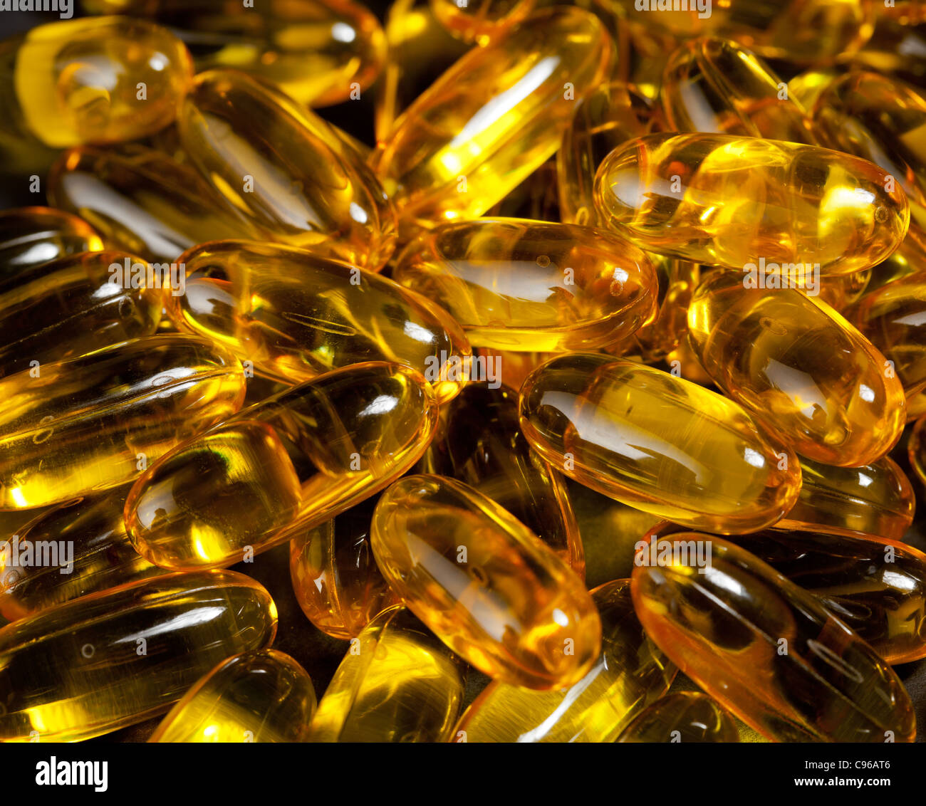 Cod liver oil capsules pile hi-res stock photography and images - Alamy