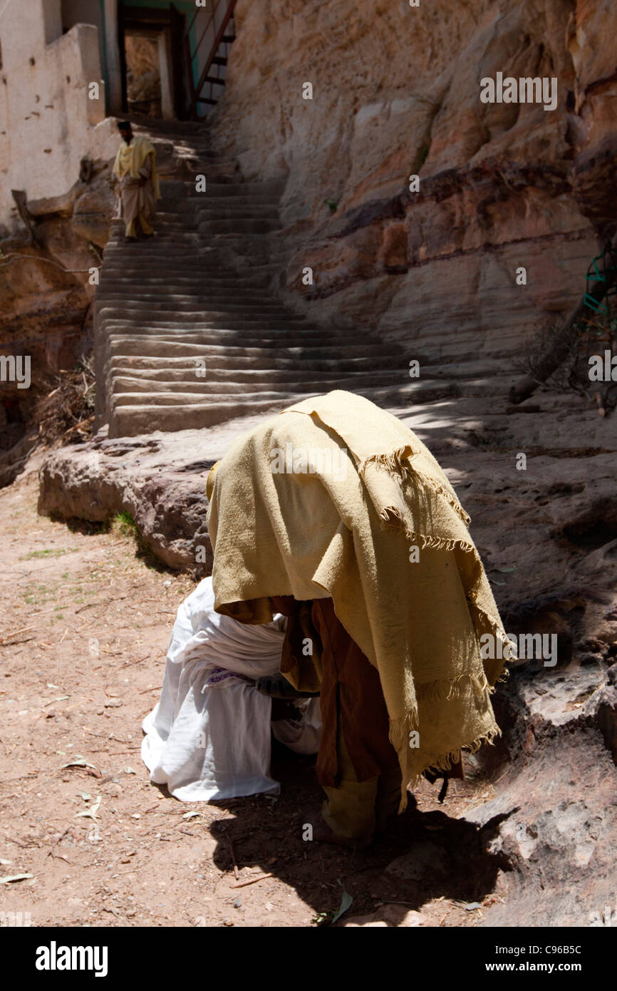 Orthodox Christian priests at the entrance to the cliff-top monastery ...