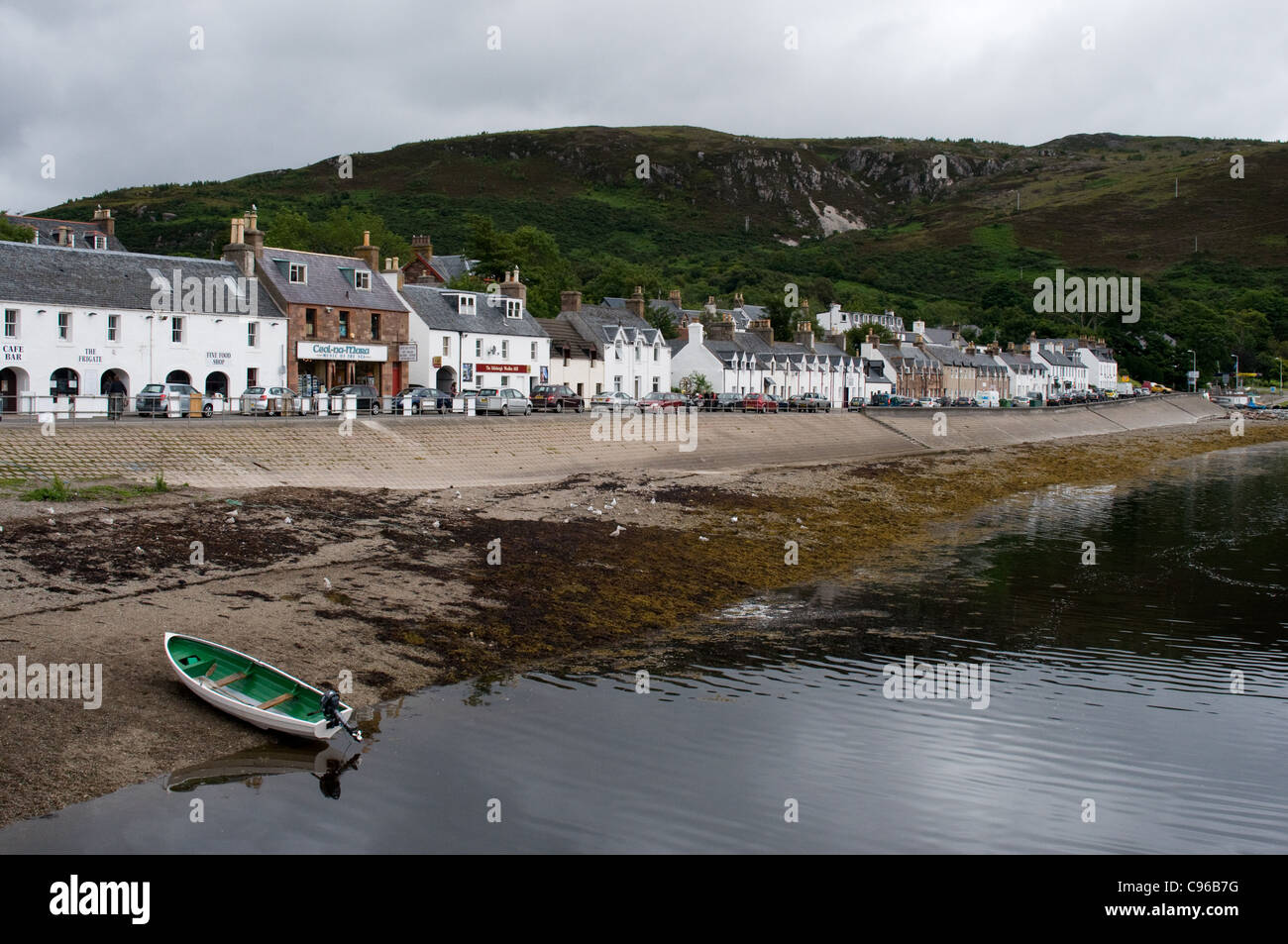 The town of Ullapool is on the shore of Lochbroom and is the port for ...