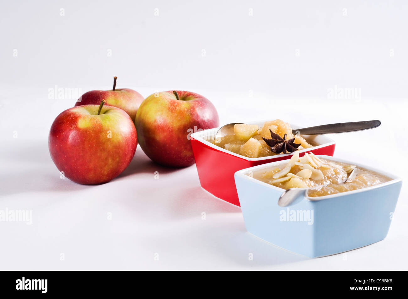 Apple compote in red and light blue bowl Stock Photo - Alamy