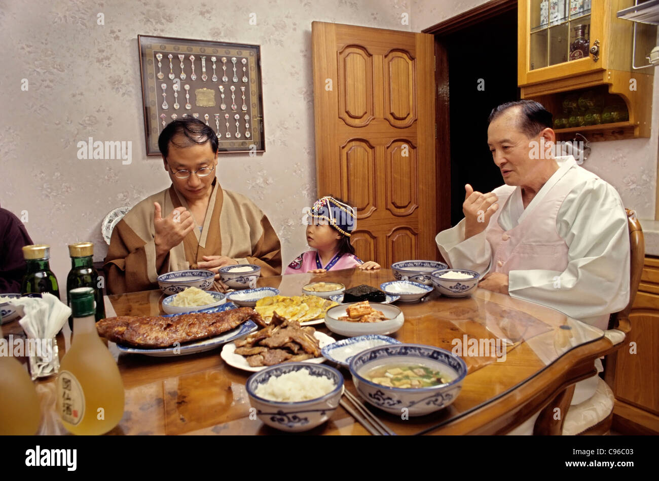 Sign of the cross before the meal in Christian family, Daegu, South ...