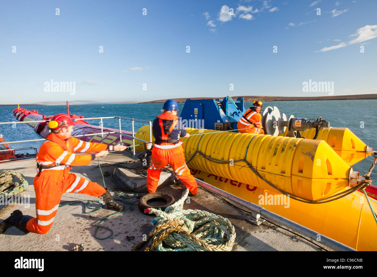 A Pelamis P2 wave energy generator on the dockside at Lyness on Hoy ...
