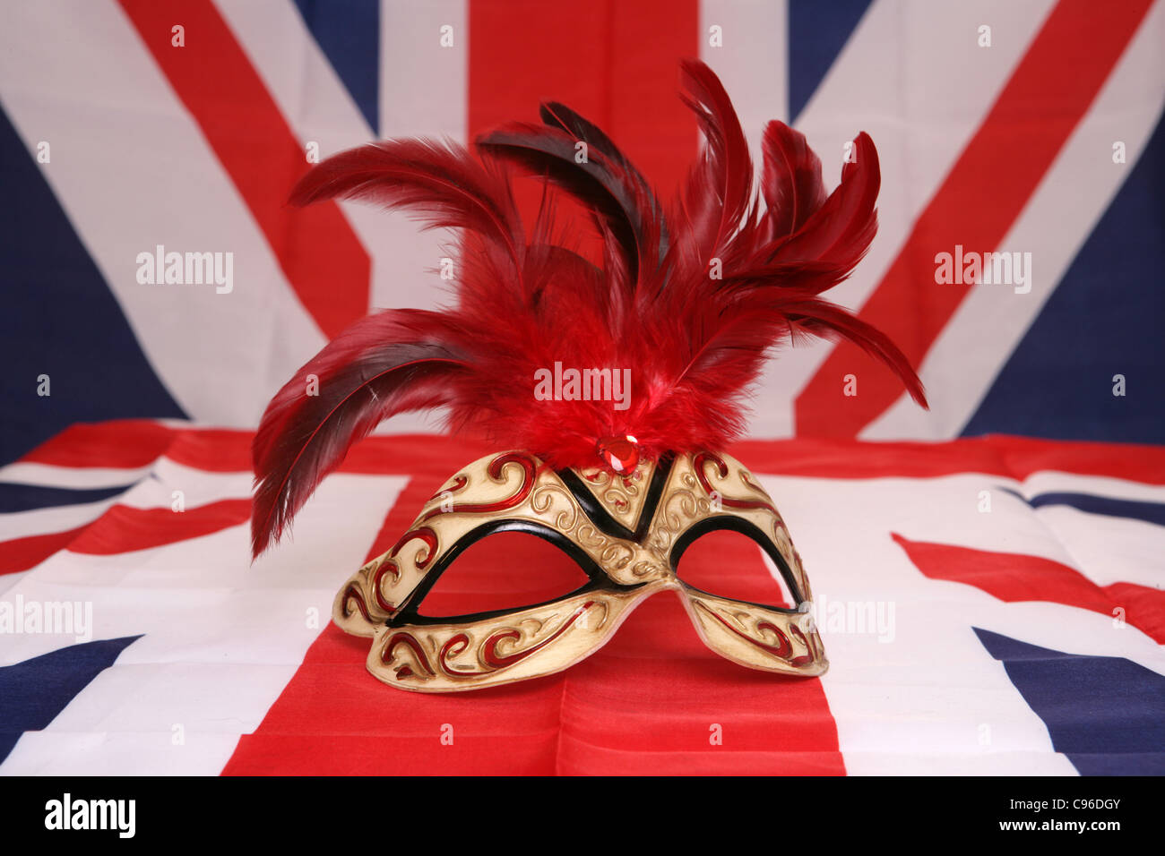 Masquerade mask on union jack flag Stock Photo - Alamy