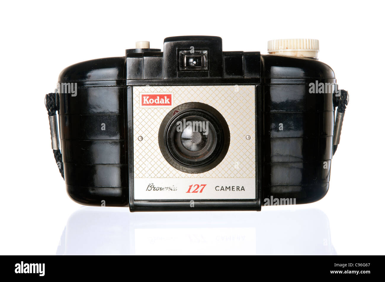 A 1960's kodak 127 brownie camera photographed against a white ...