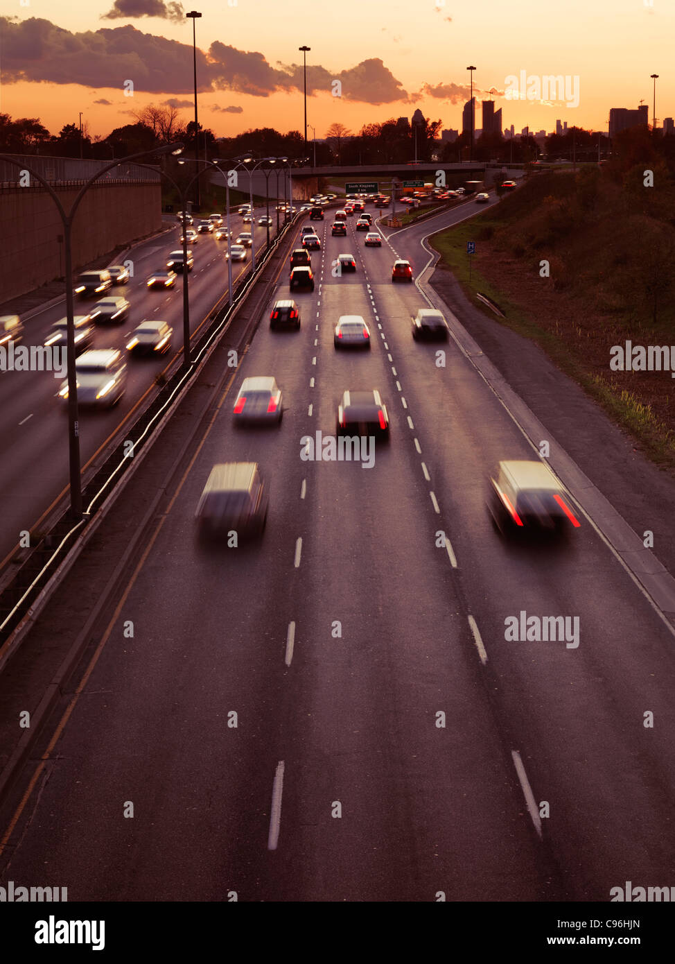 Sunset scenery of commute traffic at Toronto Gardiner Expressway ...