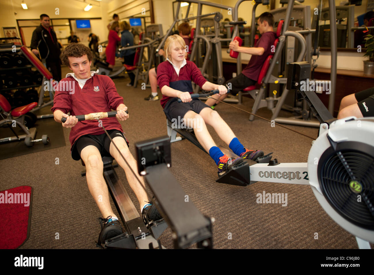 A group of teenage Secondary school boys using various exercise ...