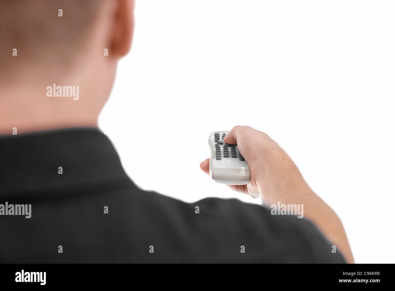 Male model pushing buttons on remote control. People and things in ...