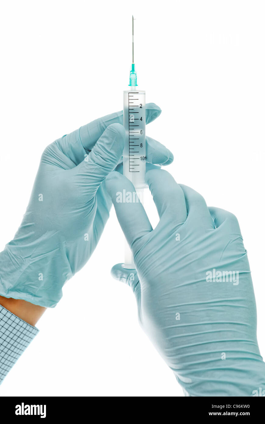 Medical doctor with syringe in hands. Health care and medical treatment ...