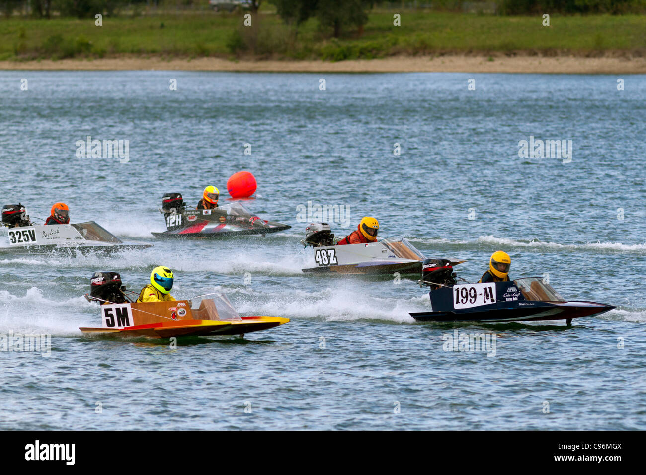 Powerboat racers at start of race Stock Photo - Alamy