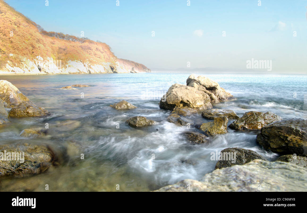 waves and stone on the japan sea Stock Photo - Alamy
