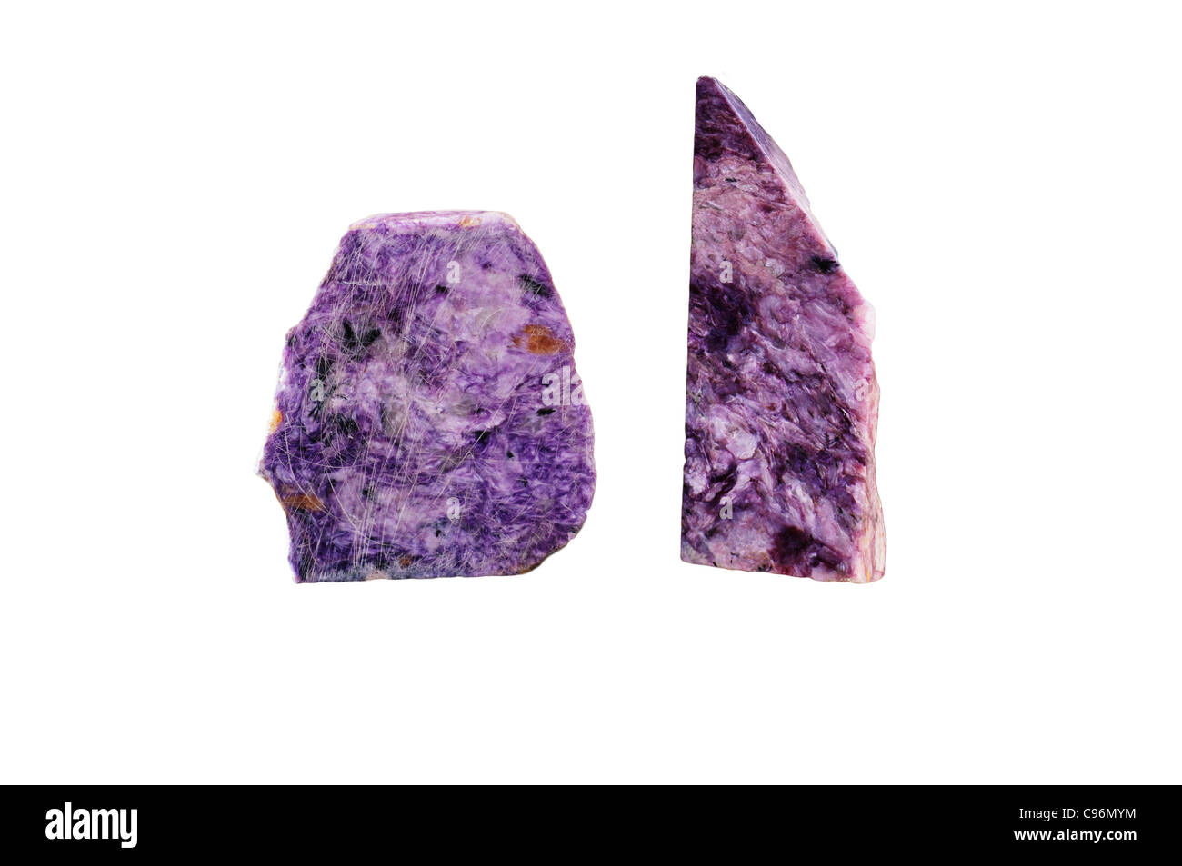 two Charoite stone on a white background Stock Photo - Alamy