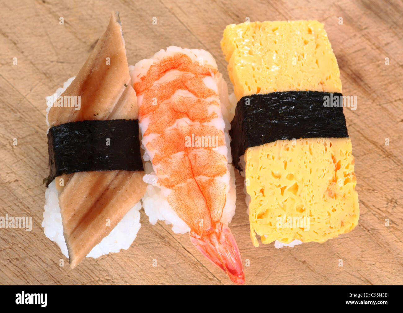 Close-up of Japanese eel, shrimp and egg nigiri zushi Stock Photo - Alamy