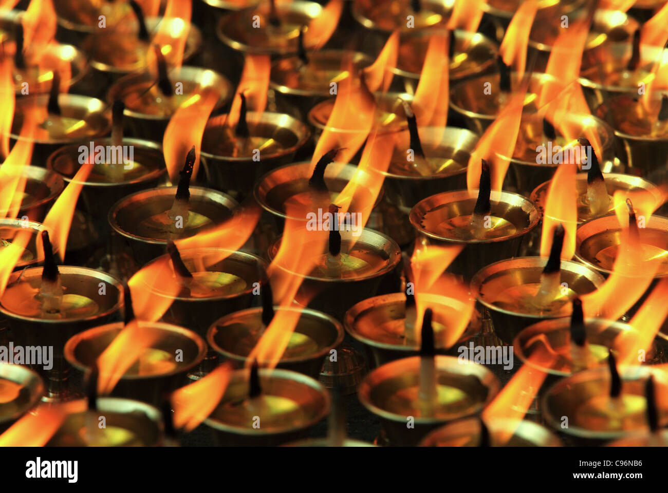 butter or oil lamps for Buddhist rituals Stock Photo - Alamy