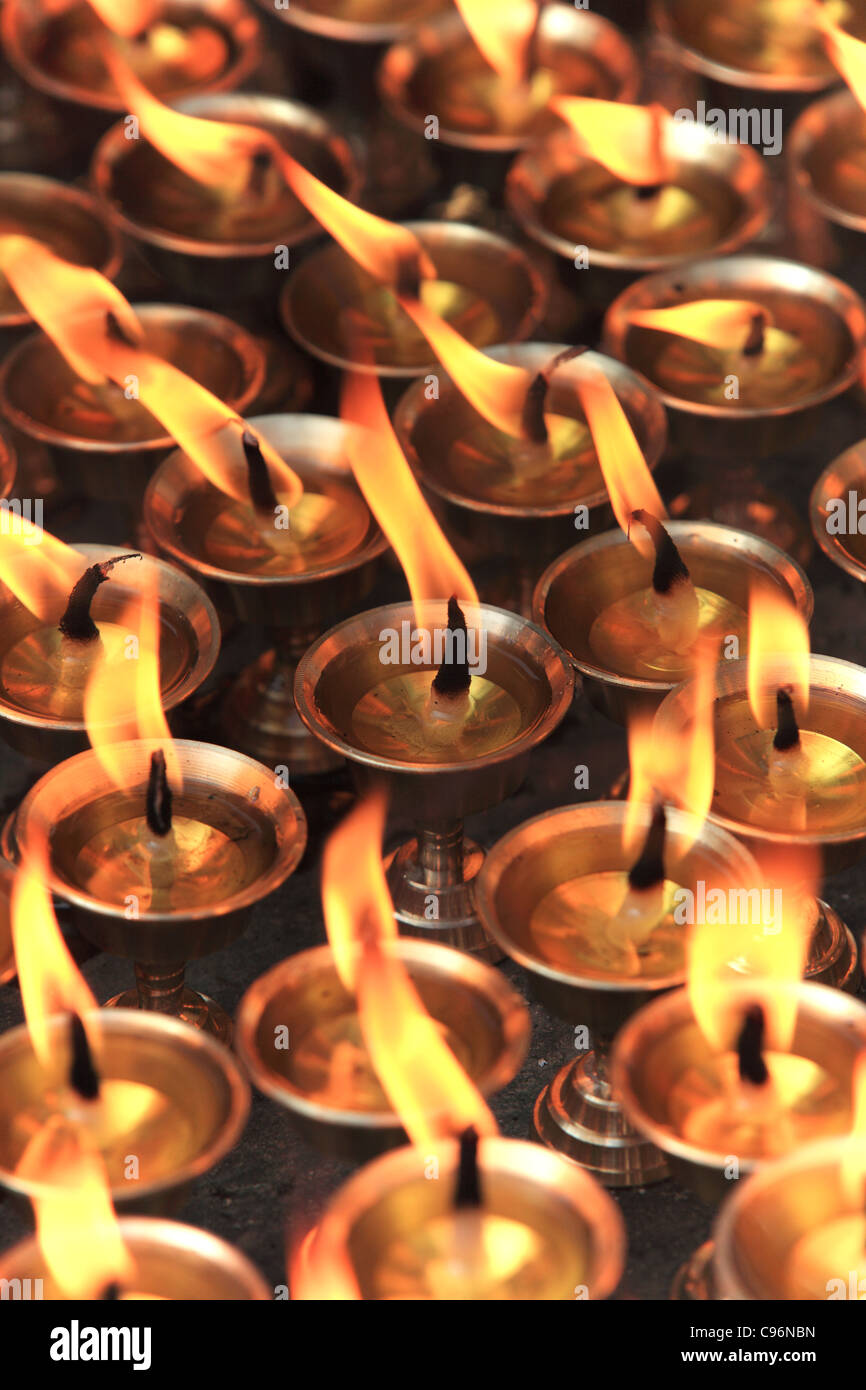 butter or oil lamps for Buddhist rituals Stock Photo - Alamy