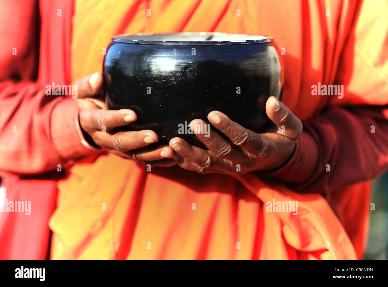 Buddhism monk accepting donation Stock Photo - Alamy