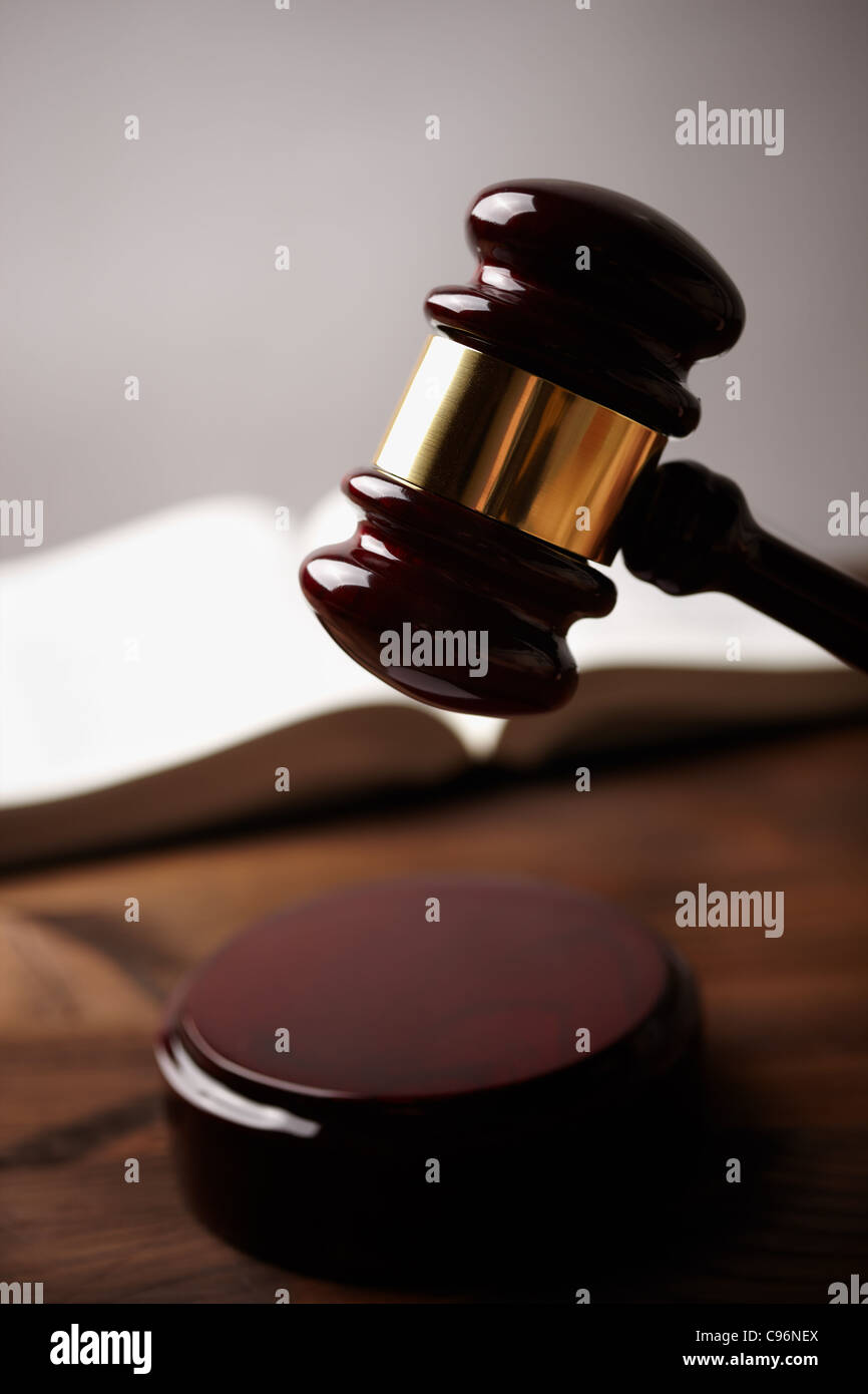 juridical concept with hammer and lawbook Stock Photo - Alamy