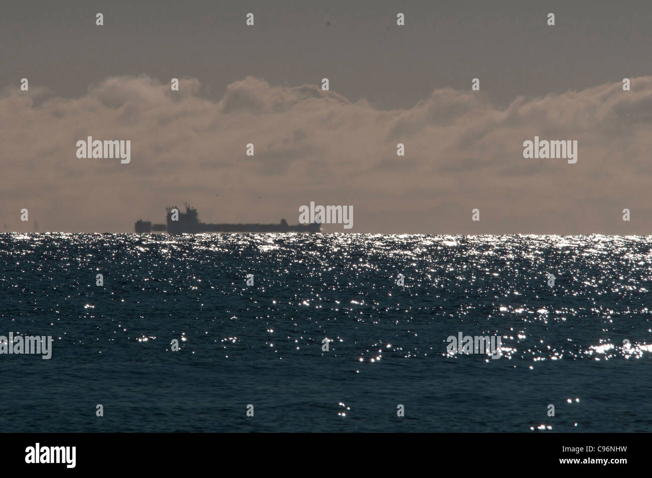 Distant vessel and glitter of sunlight on the Baltic Sea Stock Photo ...