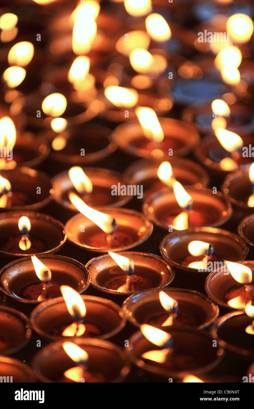 Buddhist oil lamps hi-res stock photography and images - Alamy