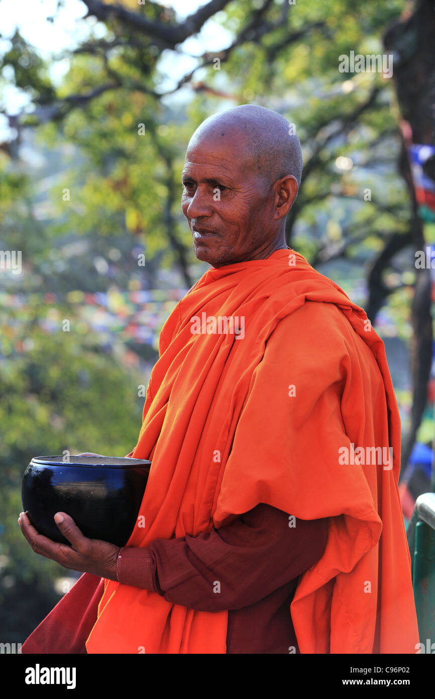 Buddhism monk accepting donation Stock Photo - Alamy