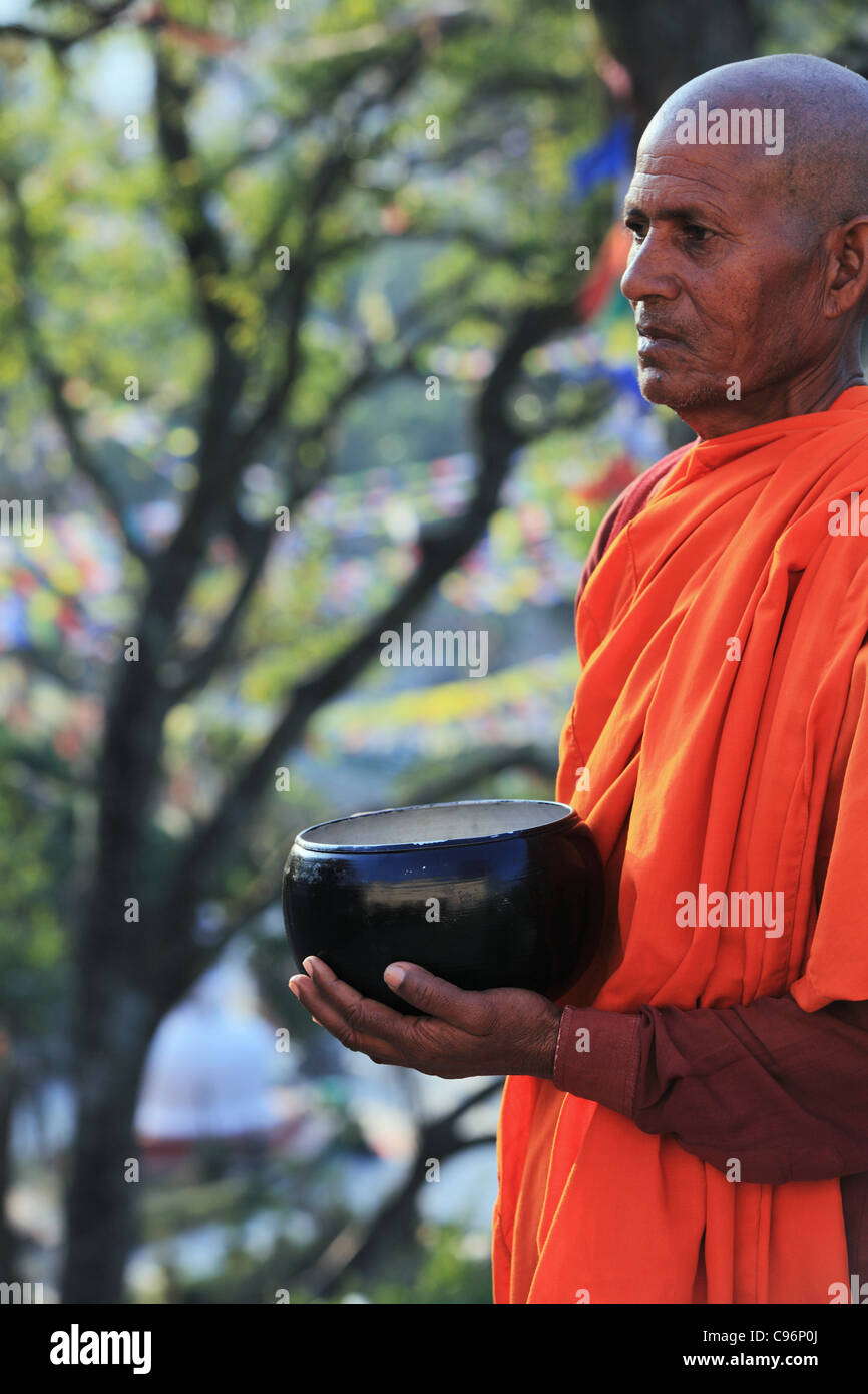 Buddhism monk accepting donation Stock Photo - Alamy