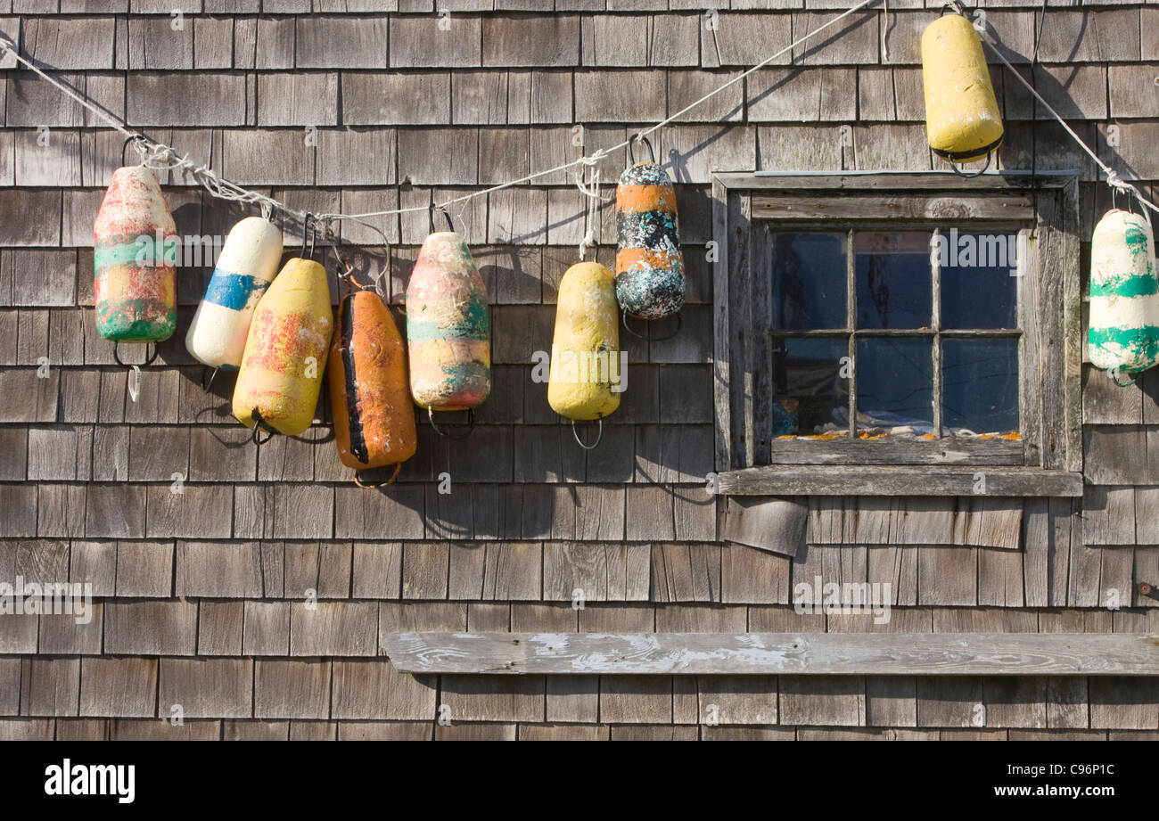 Old buoys on a exterior wall Stock Photo - Alamy