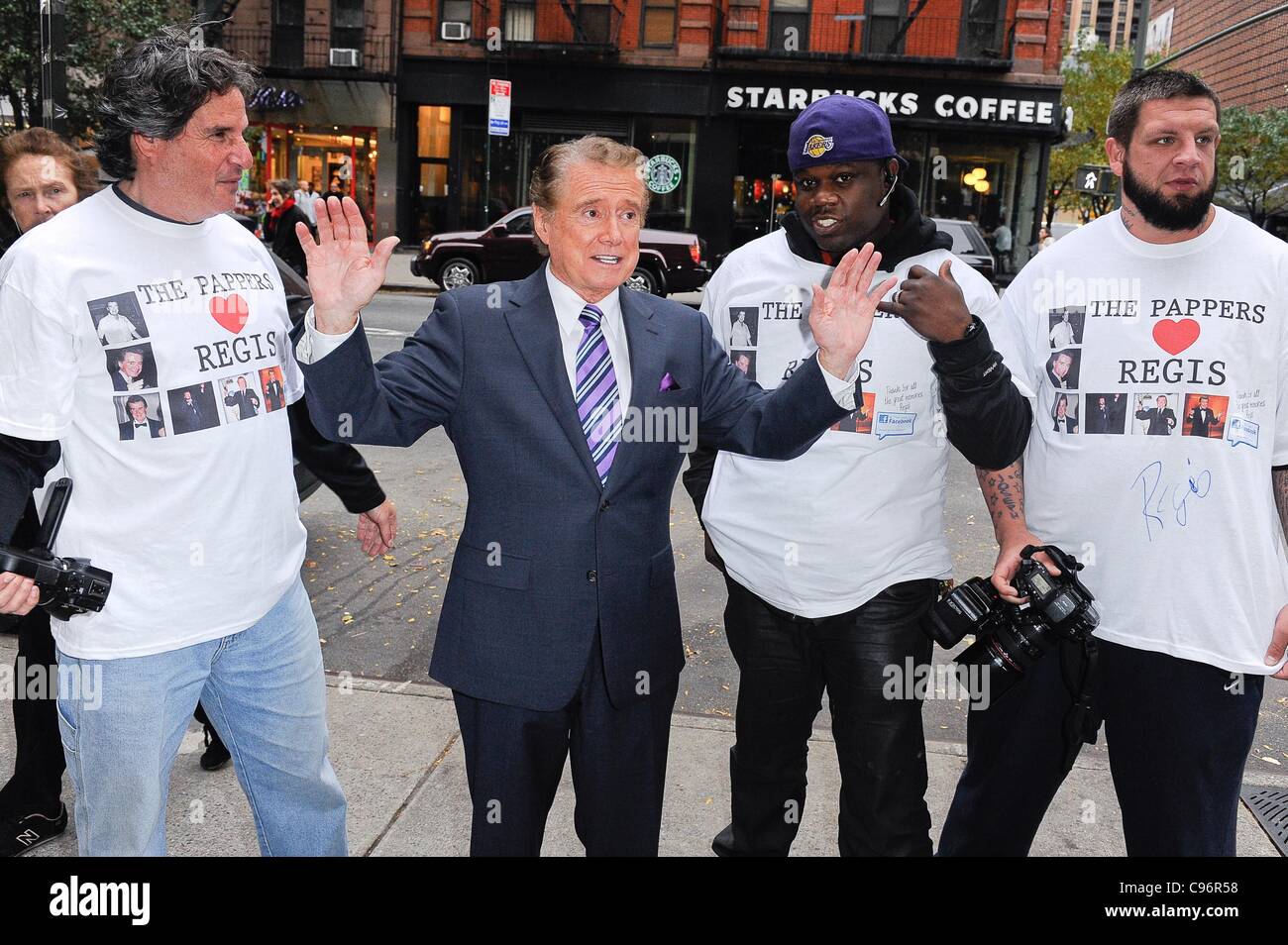 Regis Philbin, poses for photos with photographers at the 'Live With ...