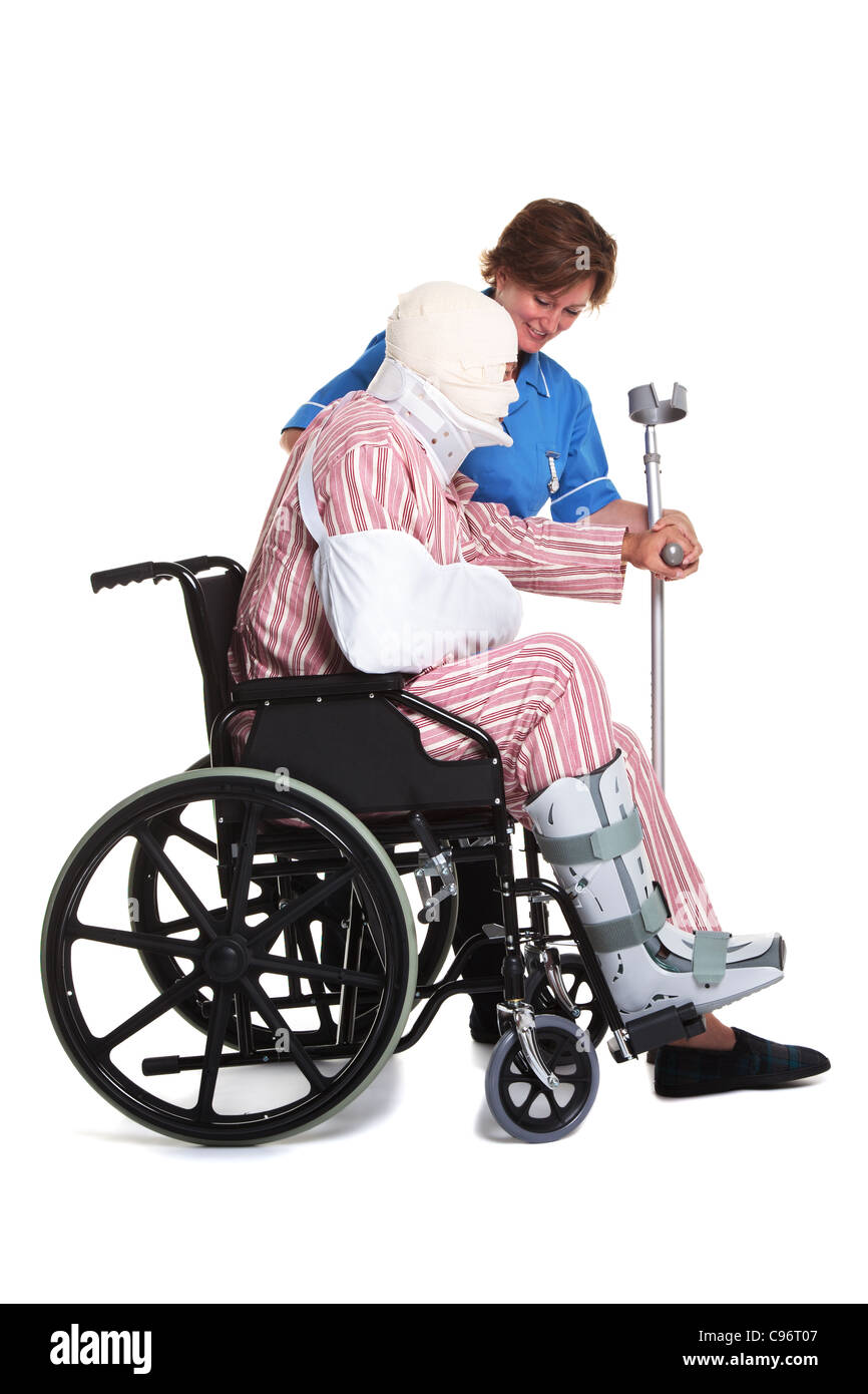 Photo of an hospital patient with multiple injuries being helped by a ...