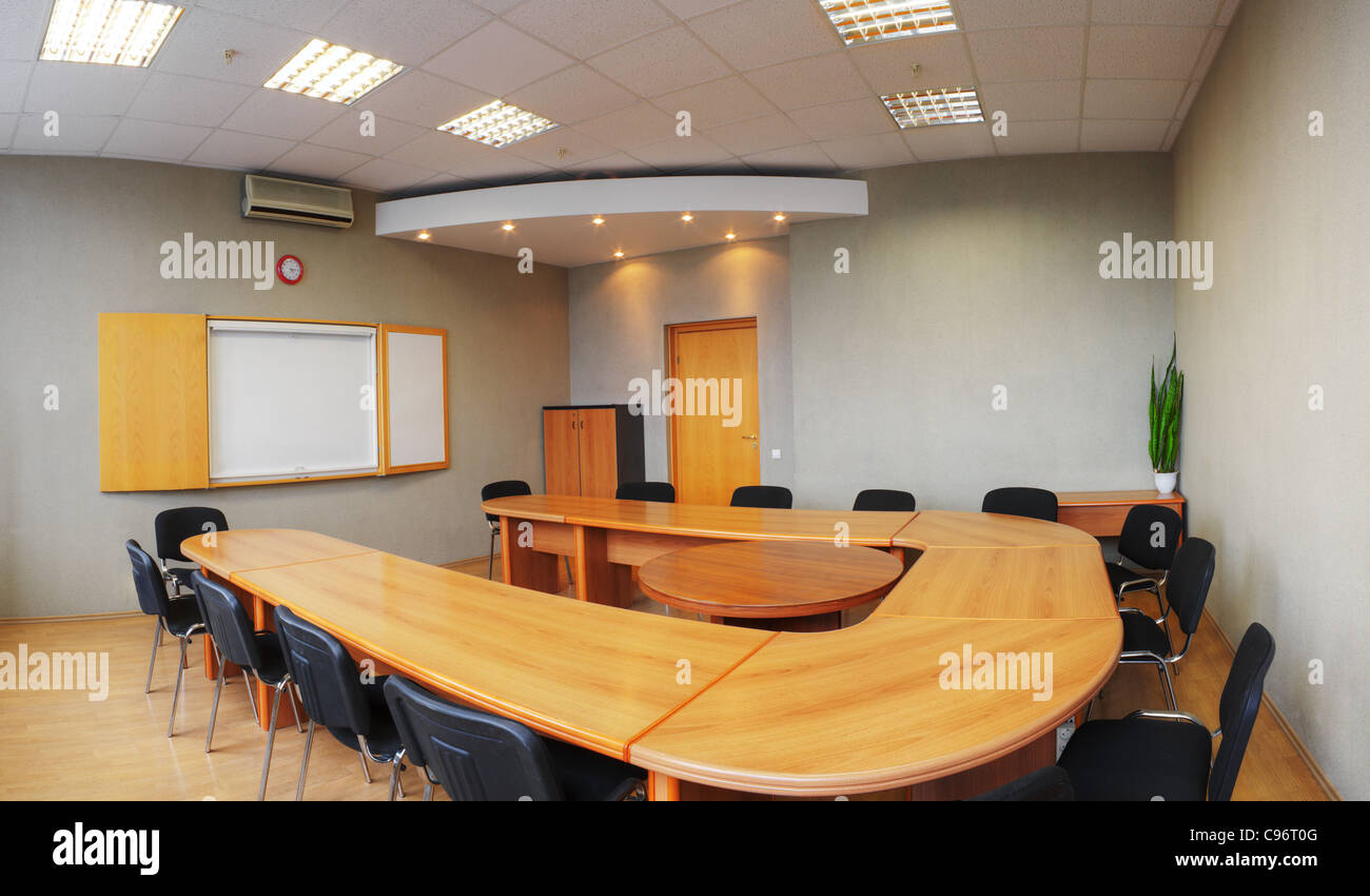 Empty room for business meetings. Blank white board and long conference ...