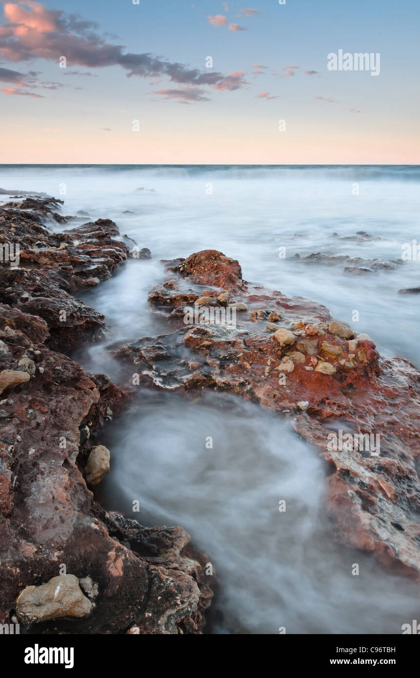 vertical seascape sunset made with wide angle lens Stock Photo - Alamy
