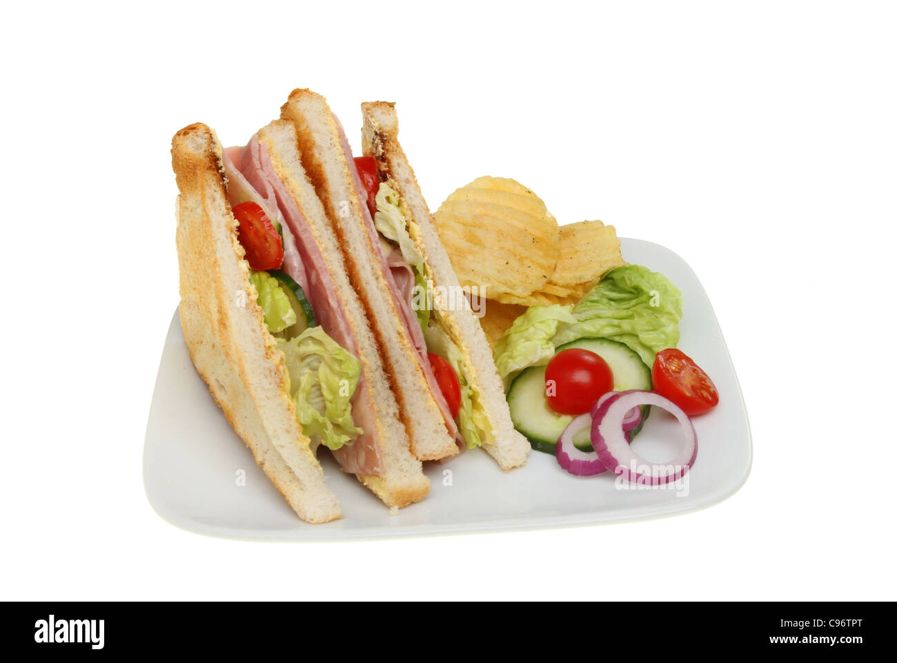Ham salad sandwich made from lightly toasted bread with salad garnish ...