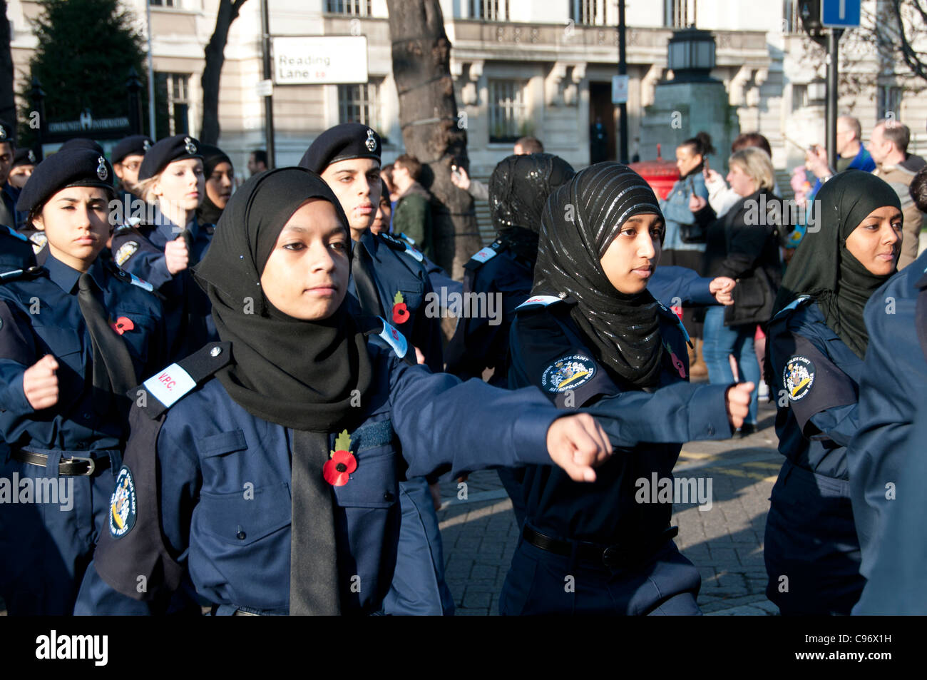 Remembrance Sunday, Young female Metropolitan Police cadets march to ...
