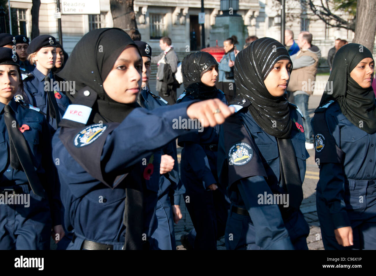 Remembrance Sunday, Young female Metropolitan Police cadets march to ...