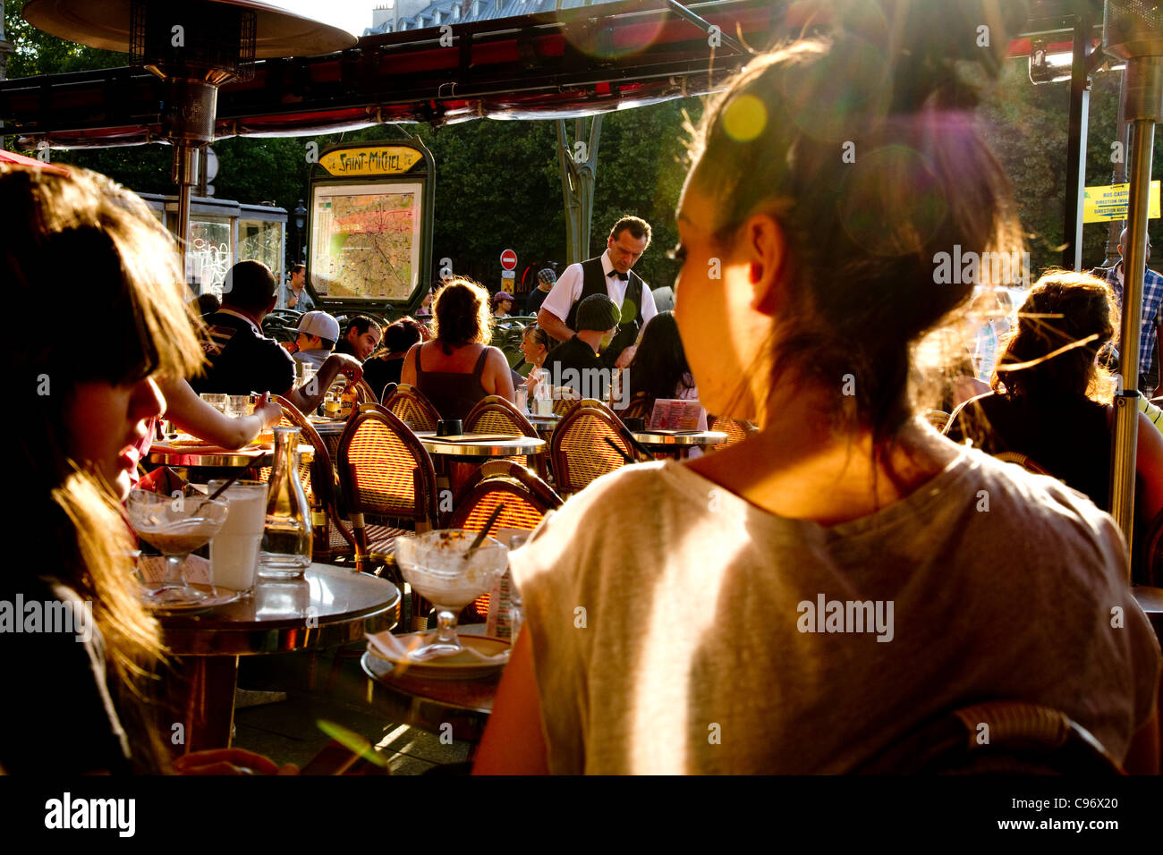 Paris a crowded cafe on the Place St Michel Stock Photo - Alamy