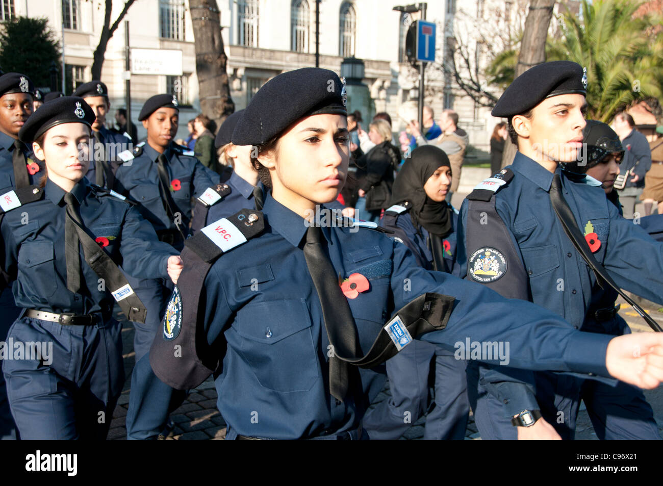 Remembrance Sunday, Young female Metropolitan Police cadets march to ...